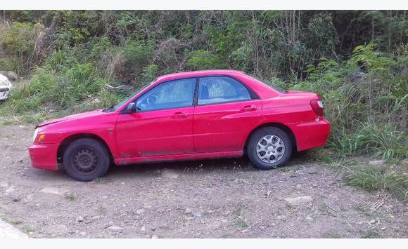 Subaru impreza rouge - Voitures Saint-Martin • Cyphoma